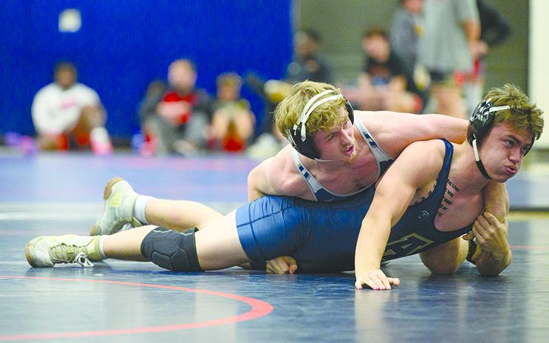 Raider wrestlers defend own mats, take 1st | The Northeast Georgian ...